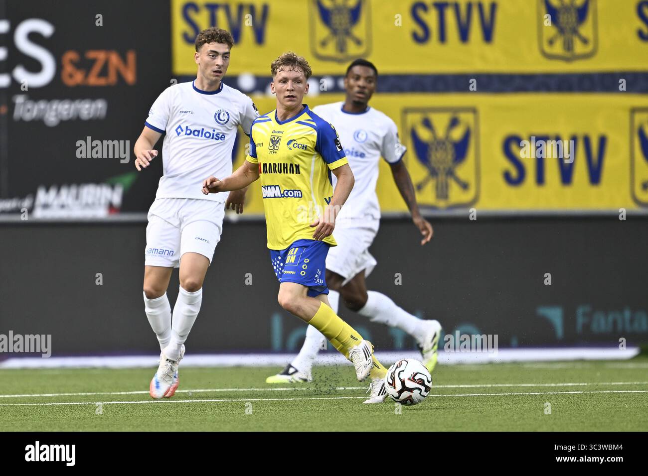 Sint Truiden, Belgium. 27th July, 2025. Gent's Mathias Delorge and STVV ...