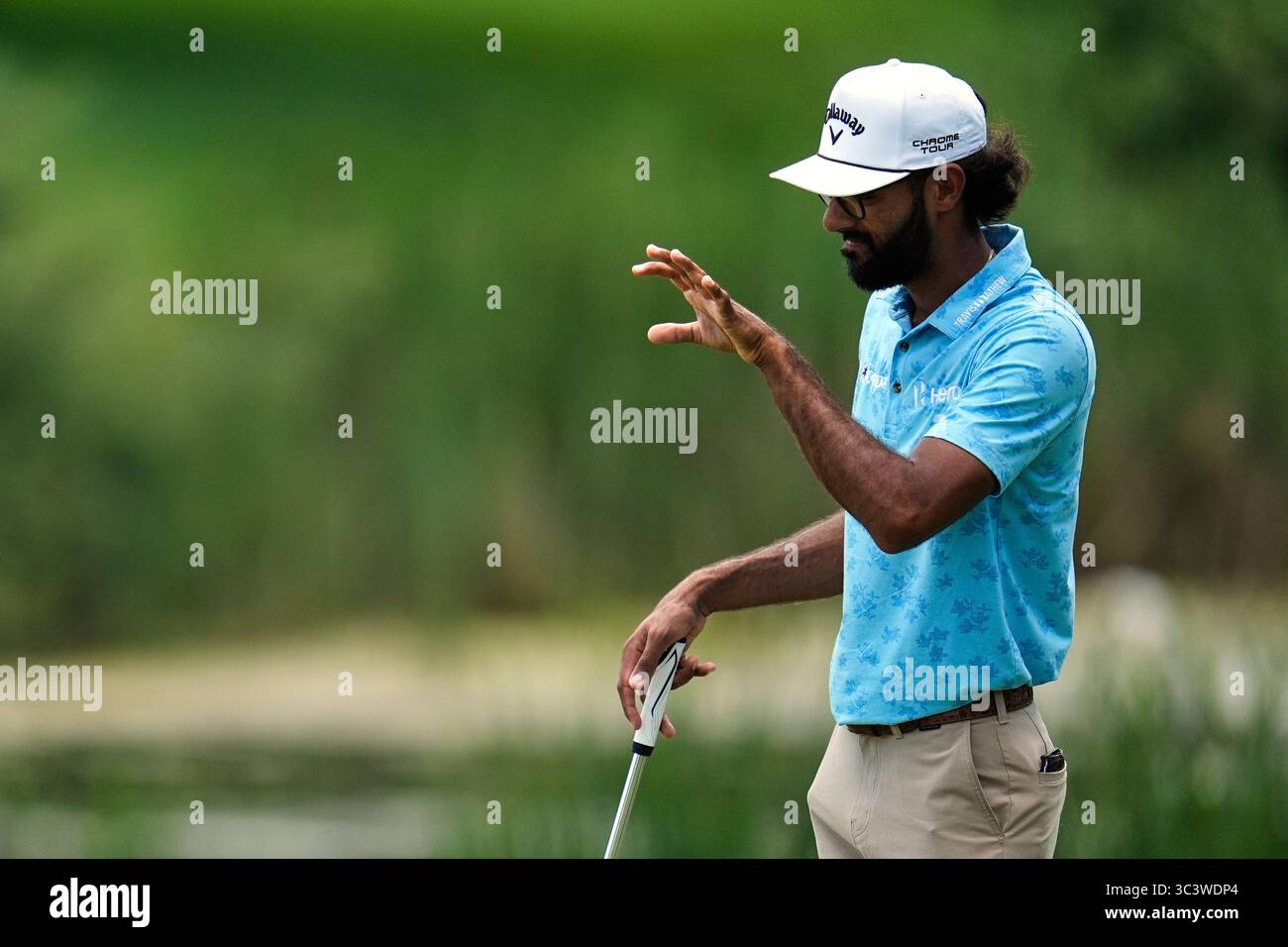 Akshay Bhatia lines up his shot on the first green during the final ...