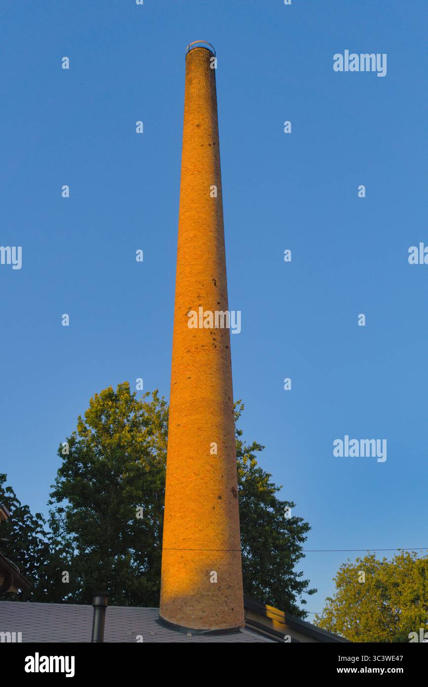 old big chimney in golden hour Stock Photo - Alamy