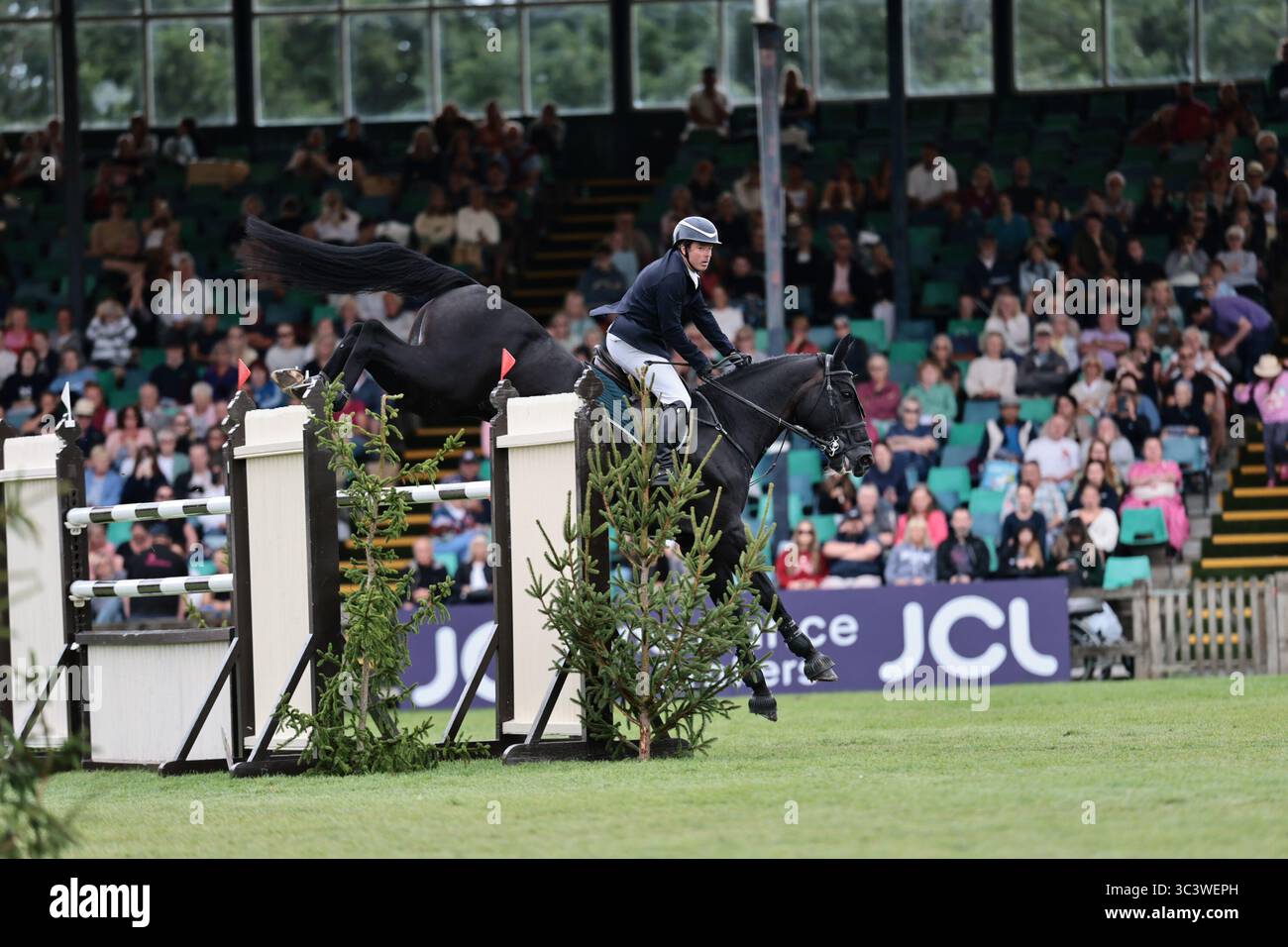 Hassocks, UK. 27 July, 2025. Robert Whitaker of Great Britain riding ...