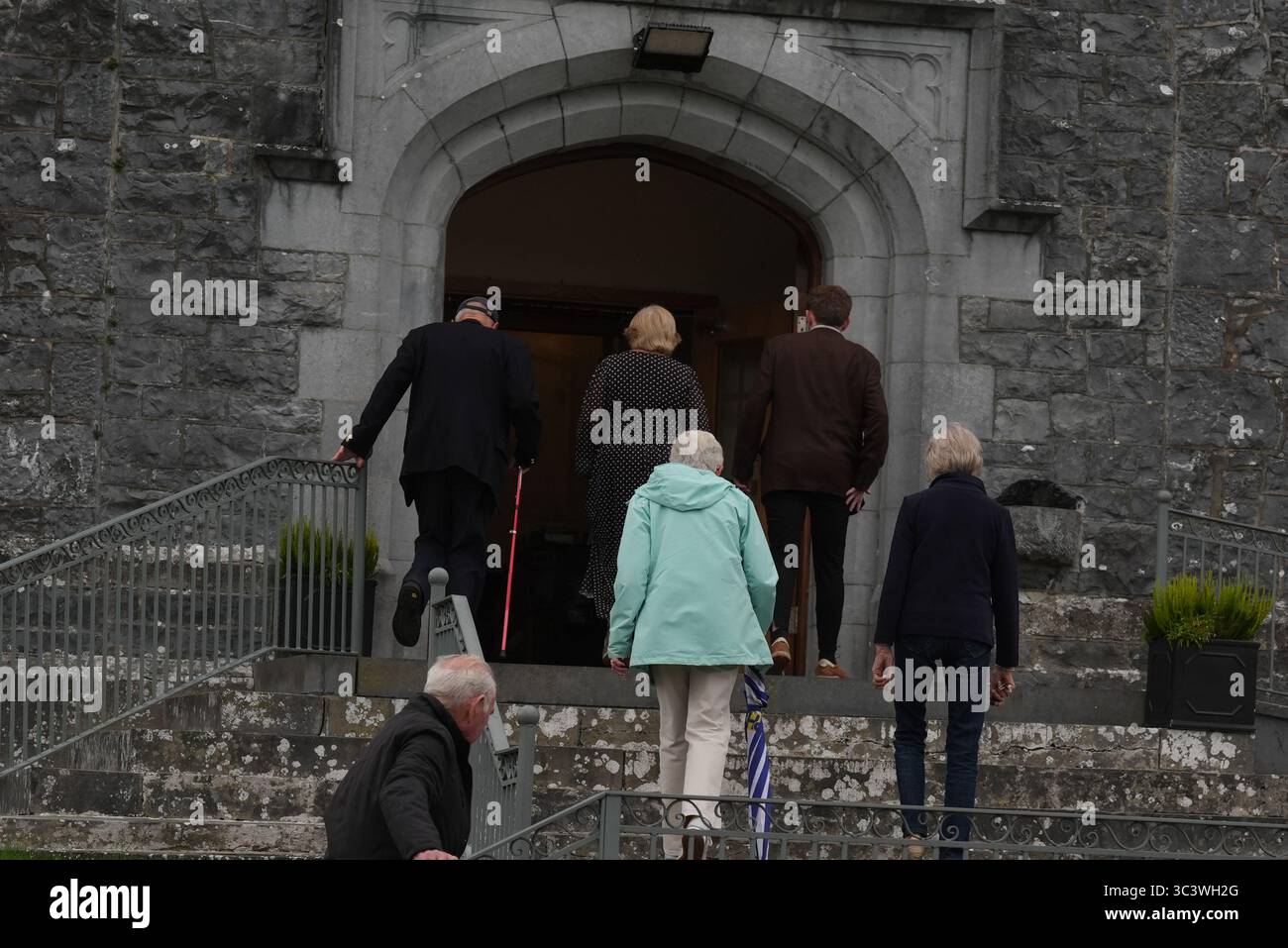 People attend a prayer service at the Church of the Immaculate ...
