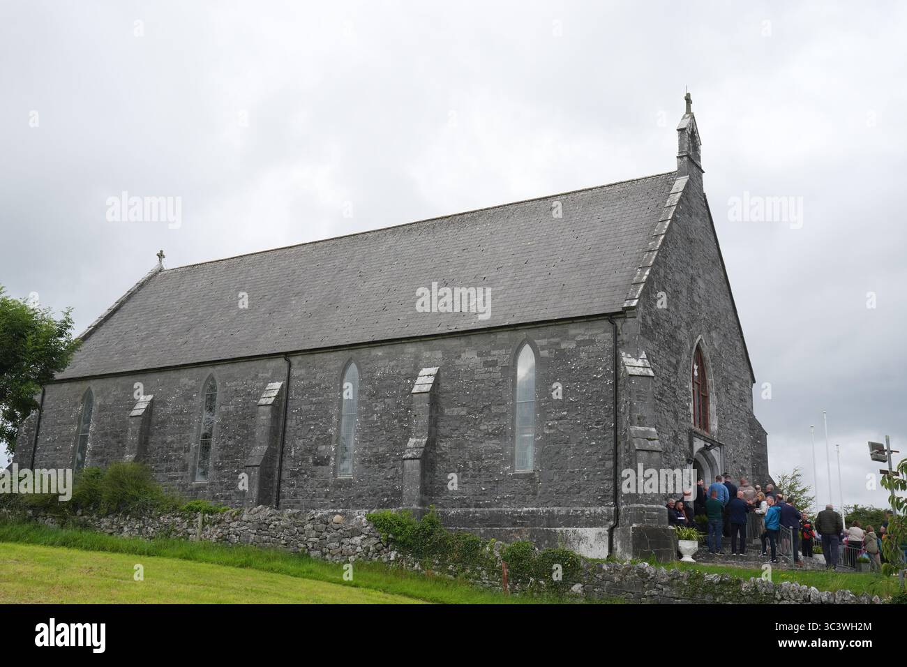 People attend a prayer service at the Church of the Immaculate ...