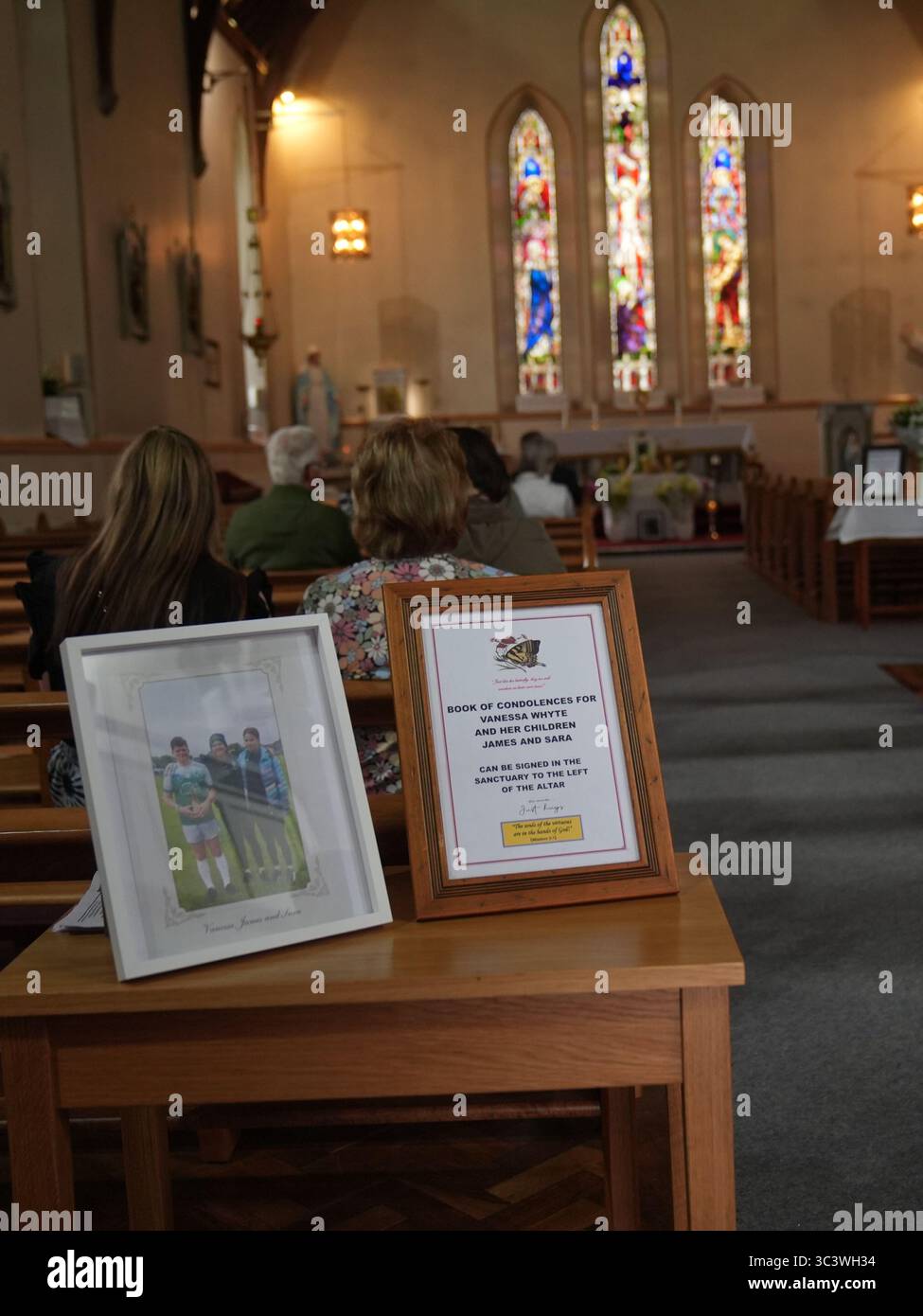 People taking part in a prayer service at the Church of the Immaculate ...