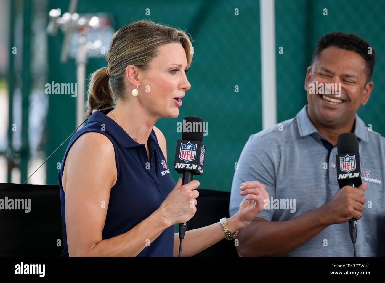 NFL Network's Stacey Dales, left, and Marc Ross, right, broadcast ...