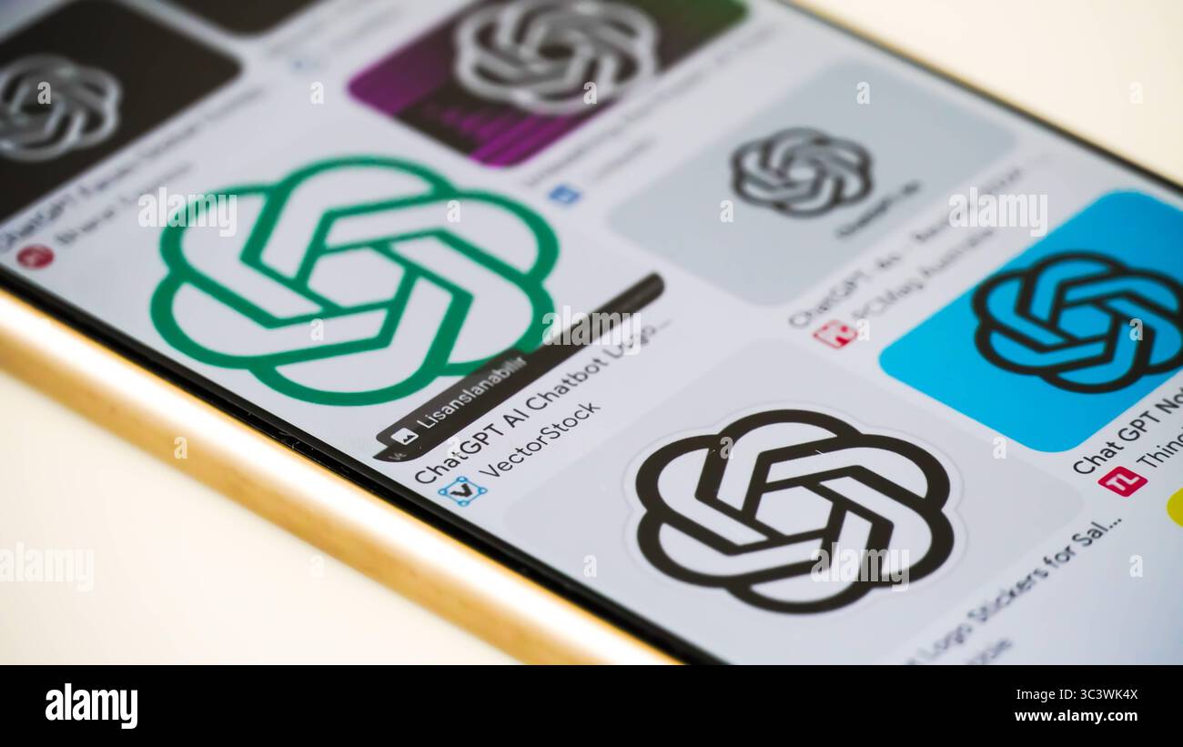 A smartphone user is seen browsing various ChatGPT AI chatbot logos A ...