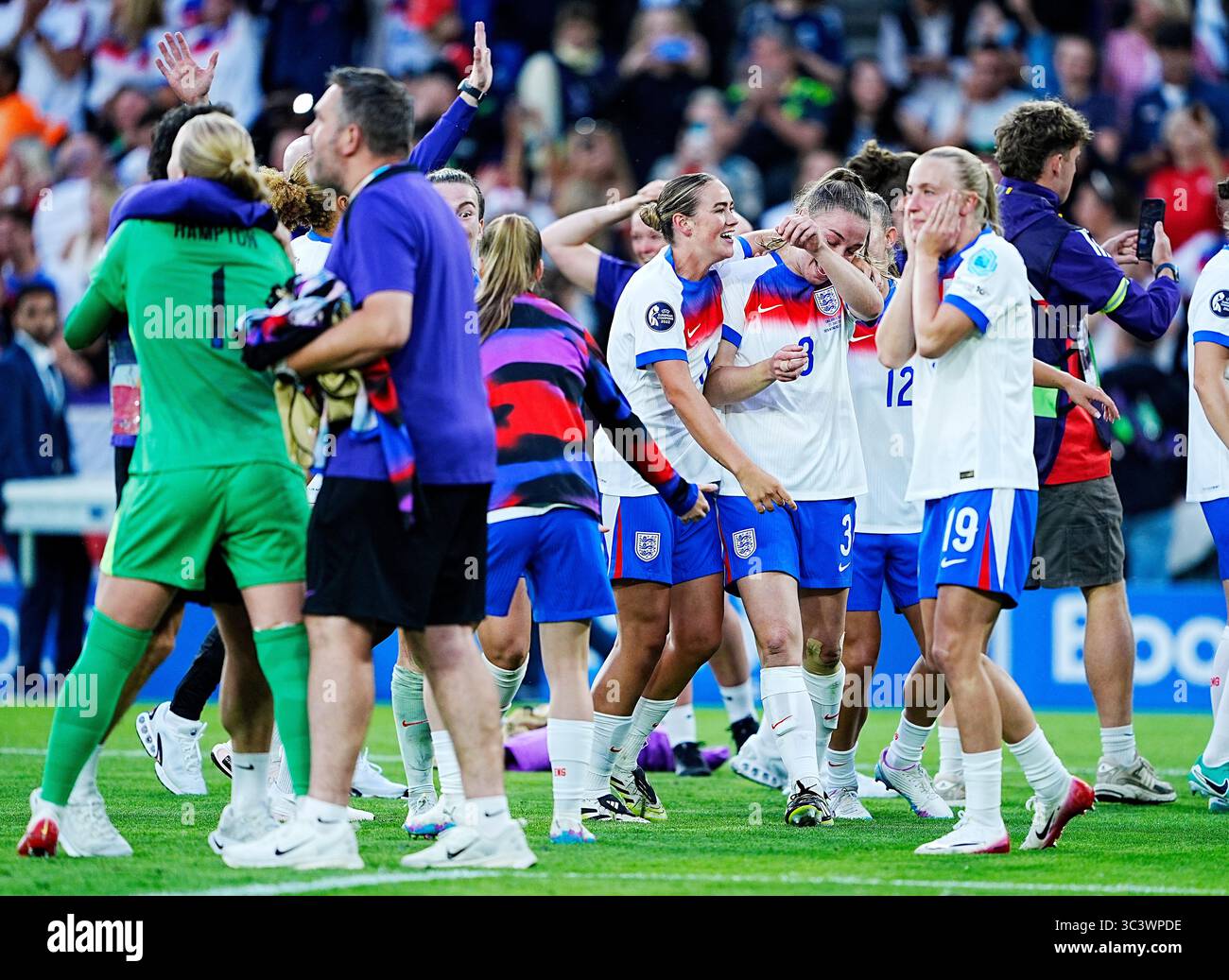 England's Grace Clinton (centre) and Niamh Charles celebrate winning ...