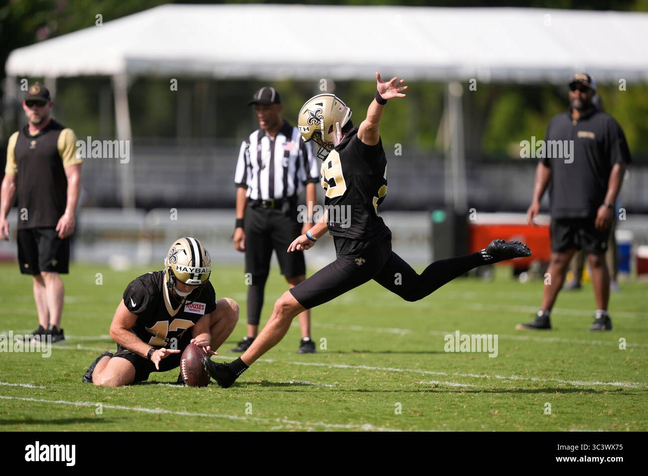 New Orleans Saints place kicker Charlie Smyth (39) and holder Matthew ...