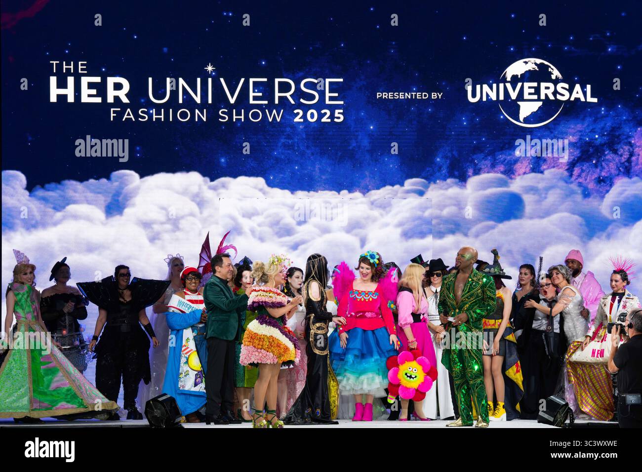 Designers and models gather on stage during the finale of the Her ...