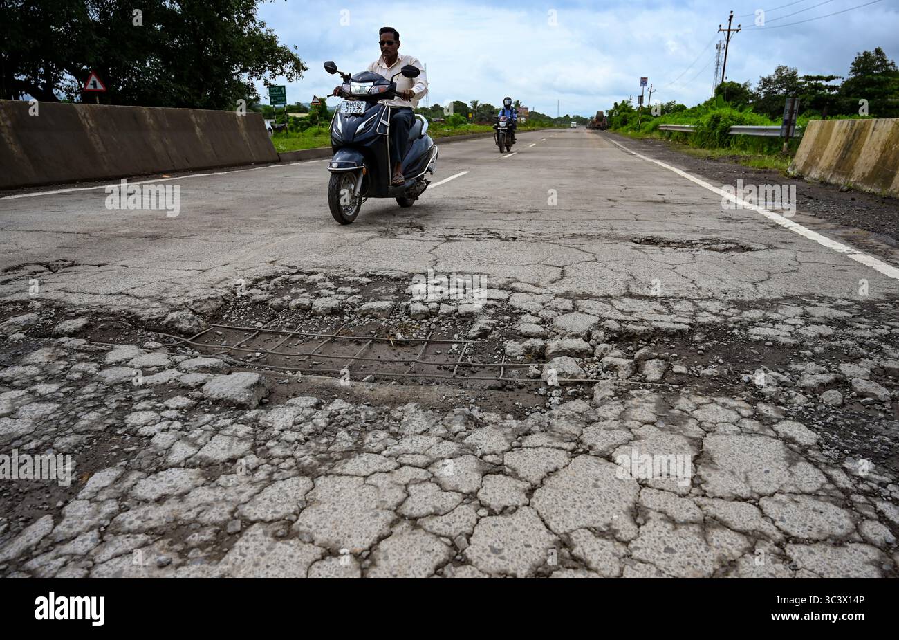RAIGAD, INDIA - JULY 27: The condition of the Mumbai-Goa Highway, also ...