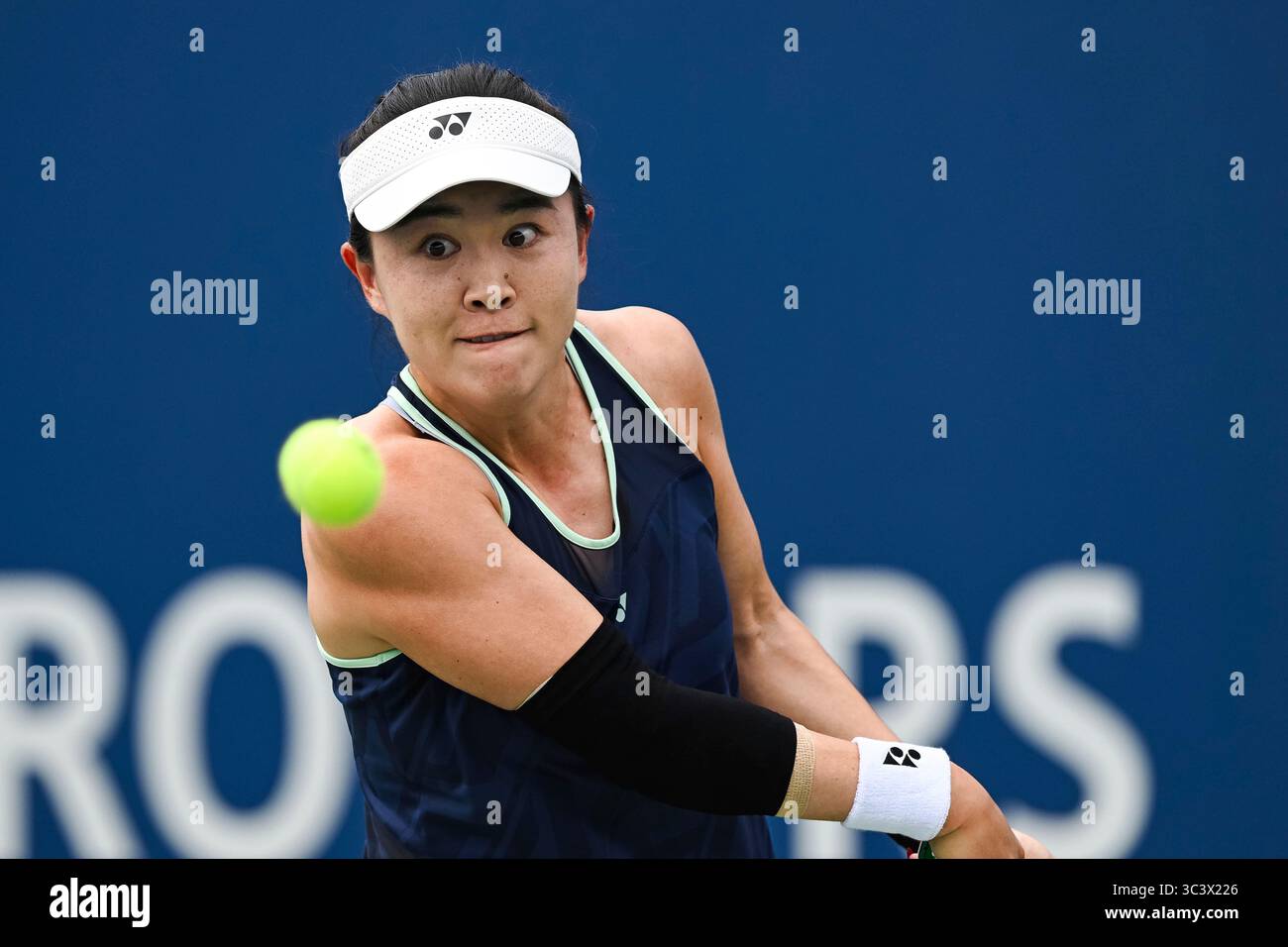 MONTREAL, QC - JULY 27: Lin Zhu (CHN) returns the ball during a first ...