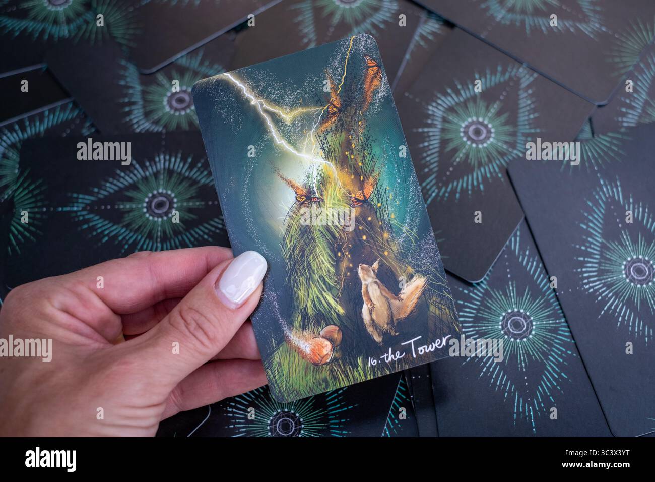 Tarot card “The Tower” symbolizing sudden upheaval, awakening, and ...
