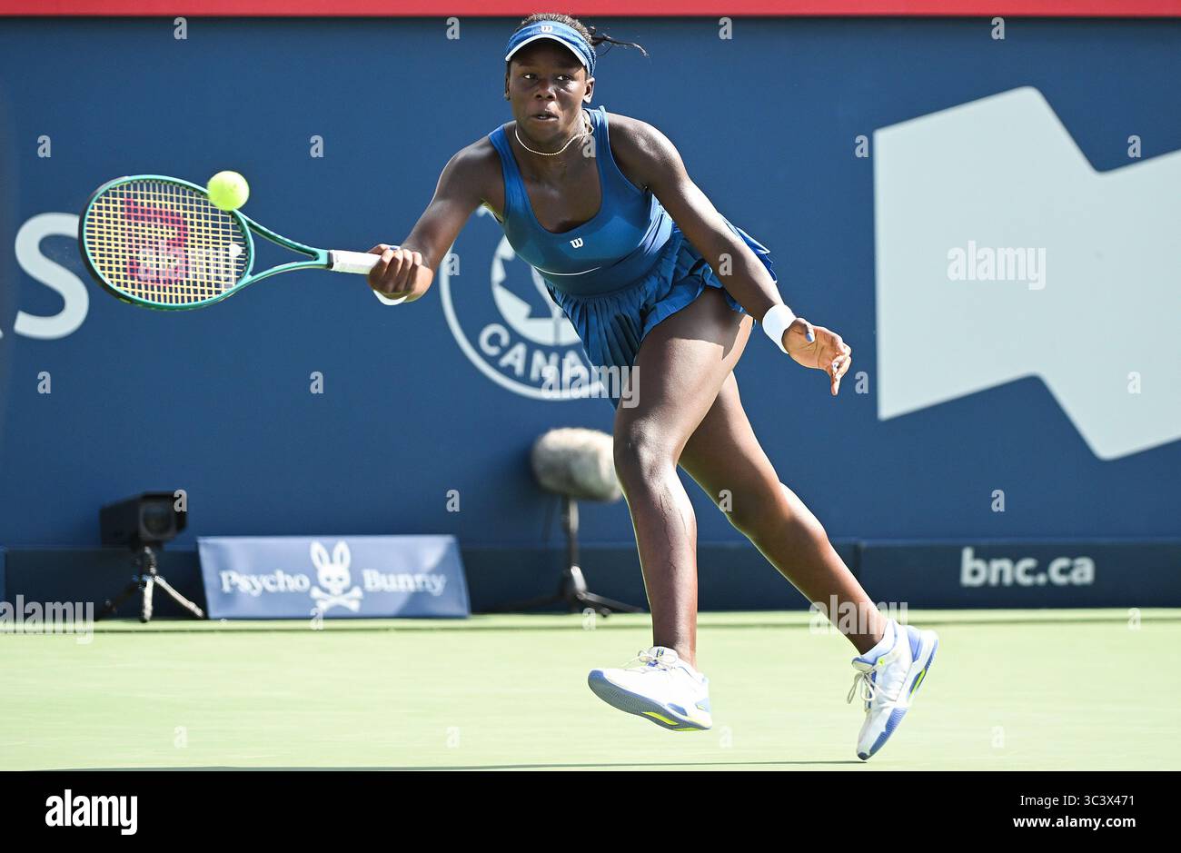 Victoria Mboko, of Canada, plays a shot to Kimberly Birrell, of ...