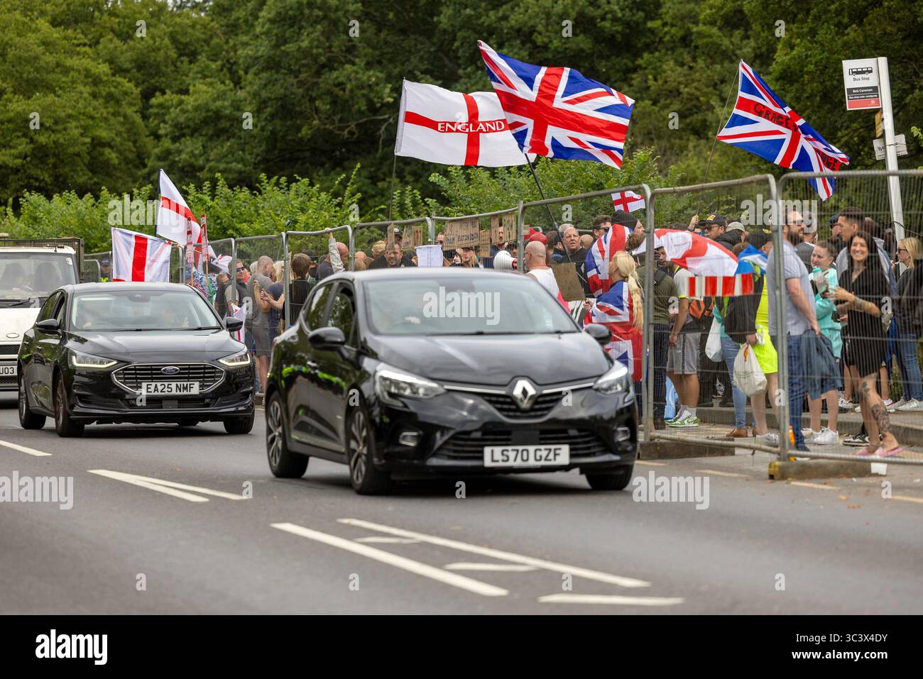 Epping, UK. 27 July 2025 Anti-immigration protesters gathered outside ...