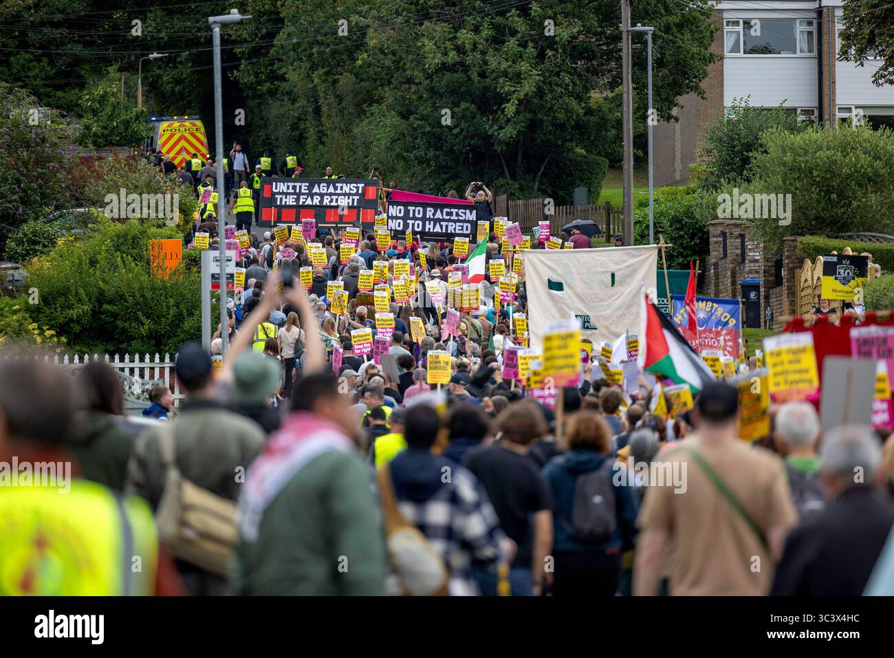 Epping, UK. 27 July 2025 Anti-immigration protesters gathered outside ...