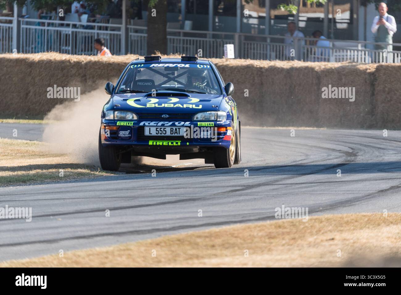 1995 Subaru Impreza 555 rally car of Colin McRae driving up the ...