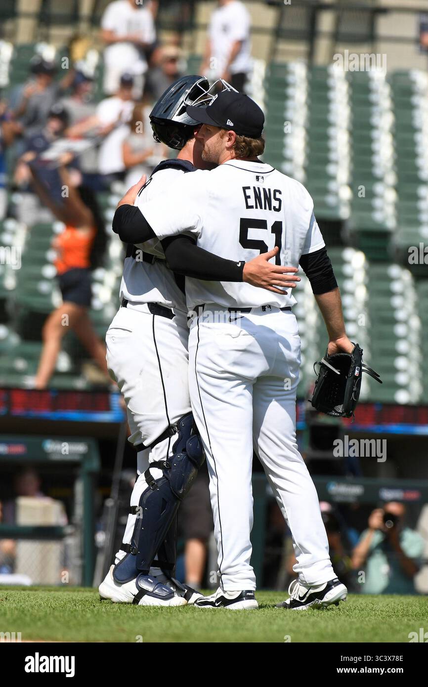Detroit Tigers catcher Dillon Dingler, left, hugs relief pitcher ...