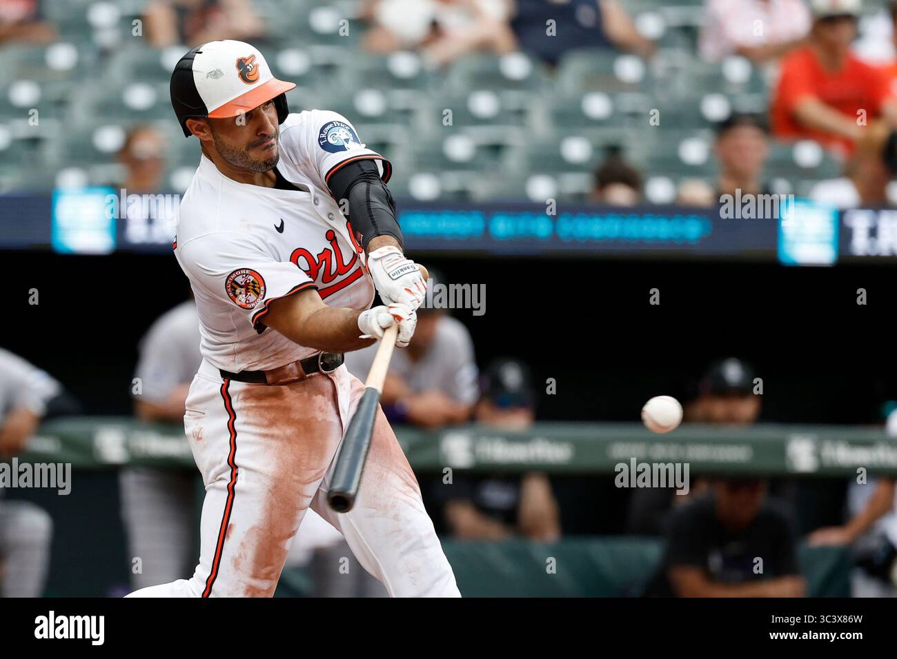Baltimore Orioles' Ramón Laureano hits a single off Colorado Rockies ...