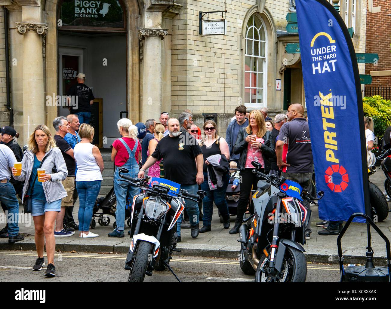 A group of people gather outside the Piggy Bank micropub at the Calne ...