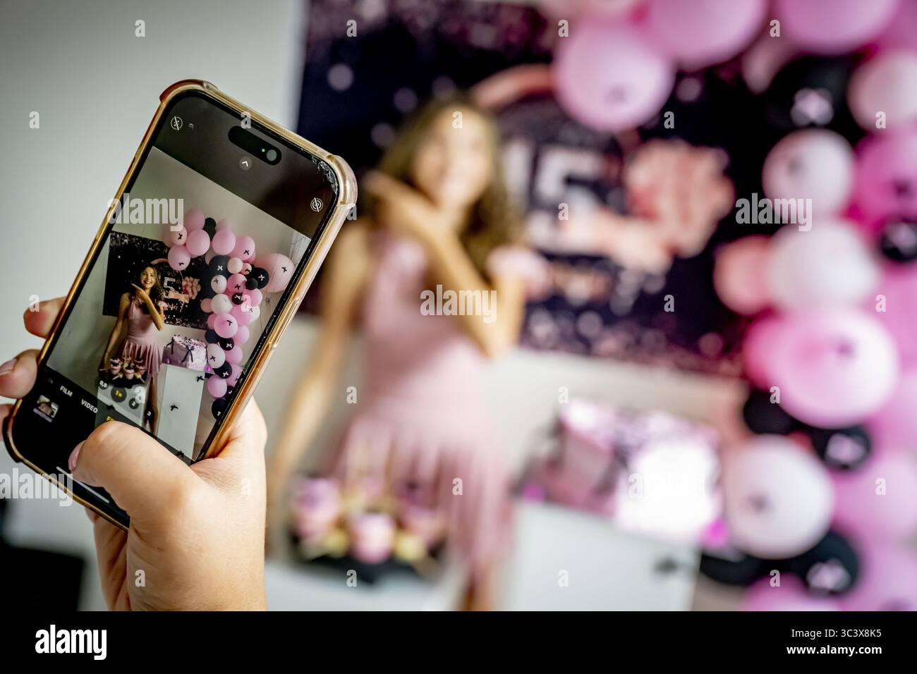 ROTTERDAM - A girl teenager celebrates her 15-year-old birthday with a ...