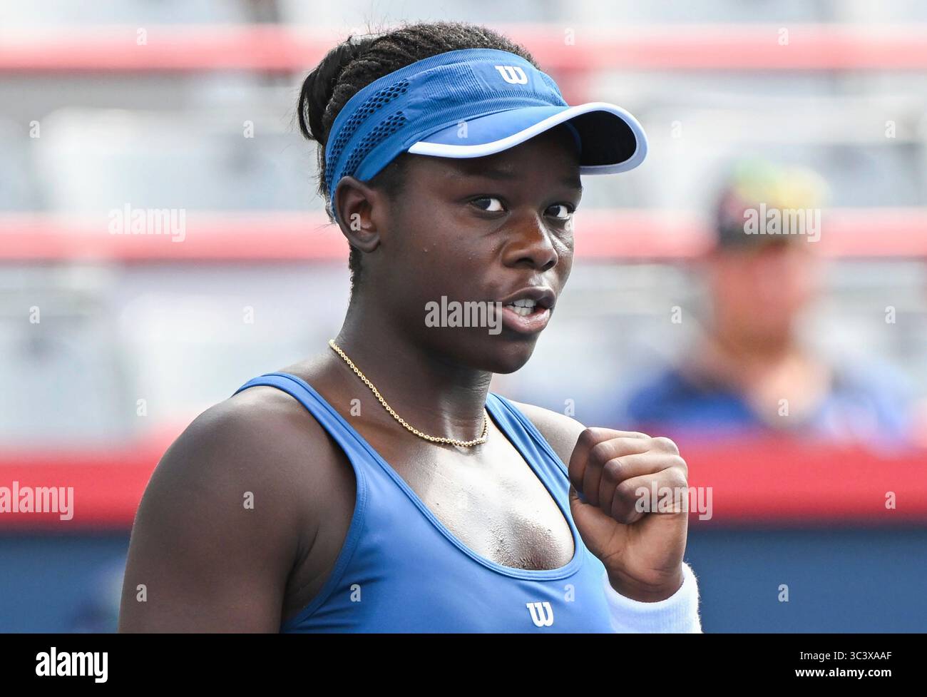 Victoria Mboko, of Canada, reacts during her first round-match against ...