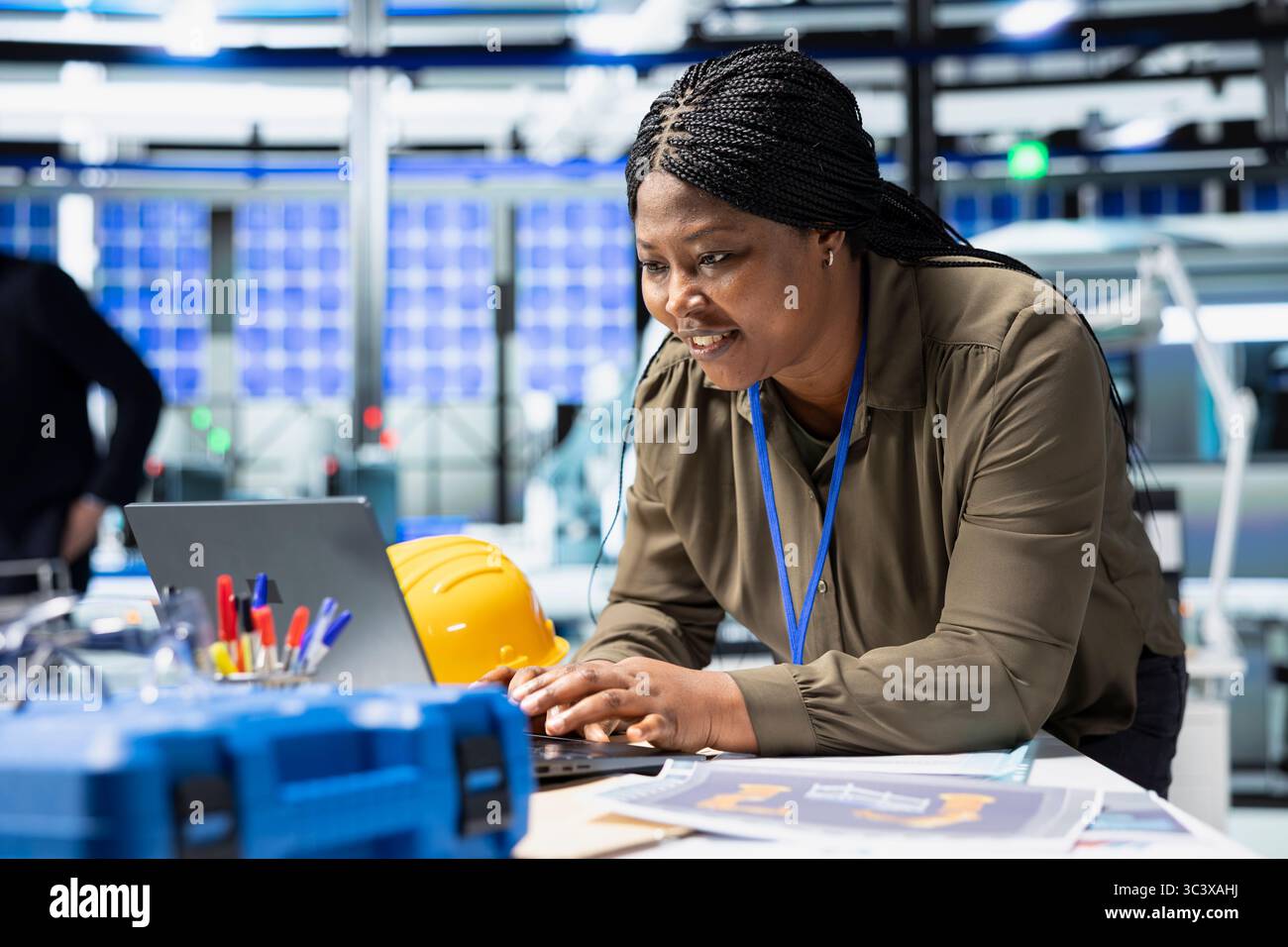 Professional inspector reviewing manufacturing process hi-res stock photography and images - Alamy