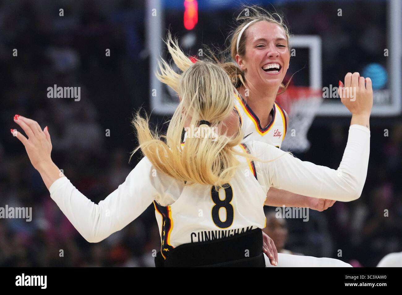 Indiana Fever guard Lexie Hull, right, celebrates with guard Sophie ...