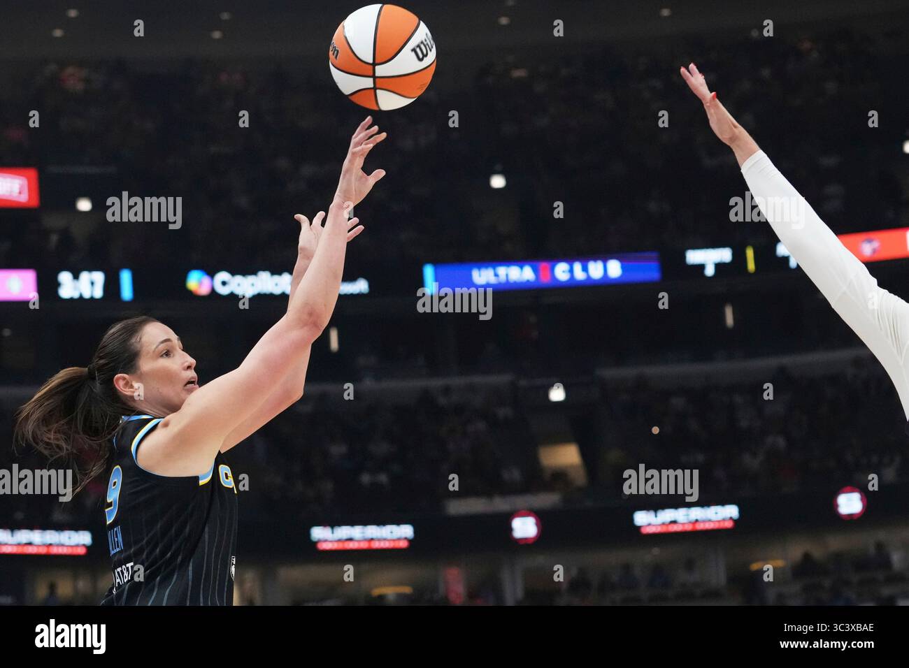 Chicago Sky guard Rebecca Allen, left, shoots over Indiana Fever guard ...