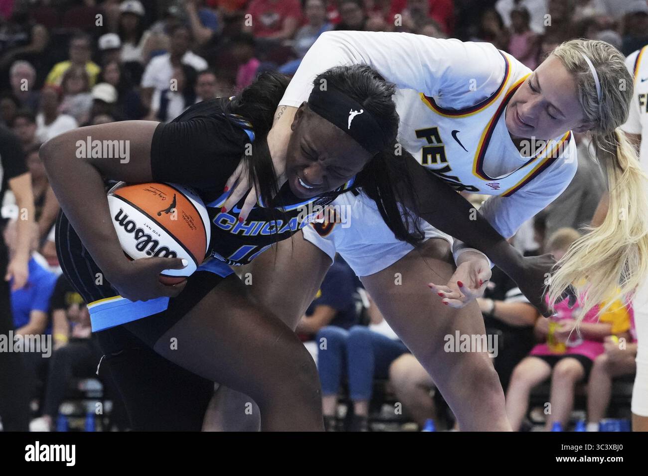 Chicago Sky center Elizabeth Williams, left, battles for the ball ...