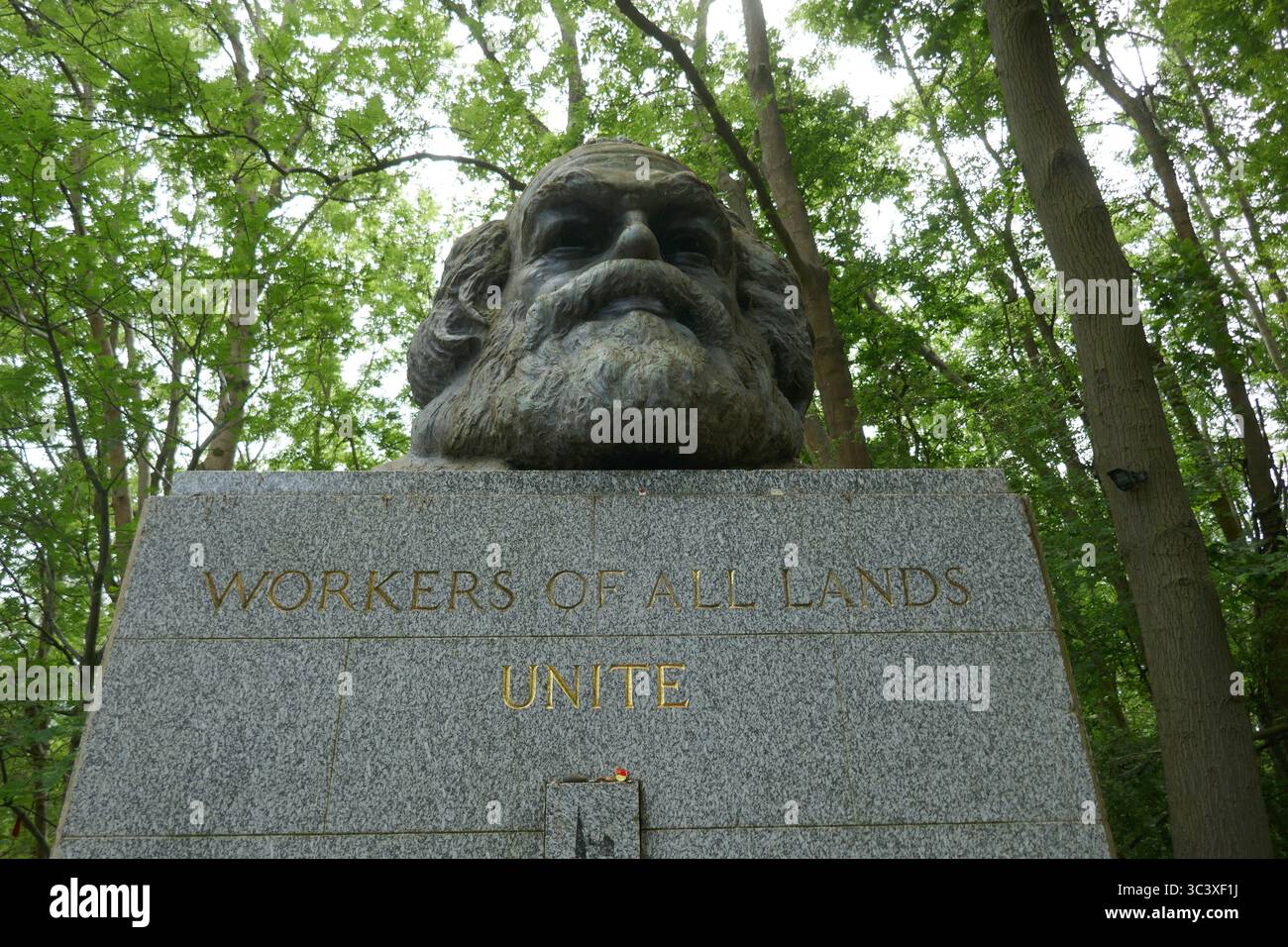 London, England 29th May 2025 Karl Marx Grave and Statue at Highgate ...