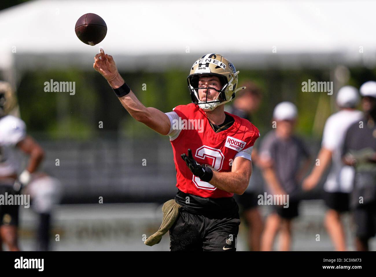 New Orleans Saints quarterback Jake Haener (3) goes through drills ...