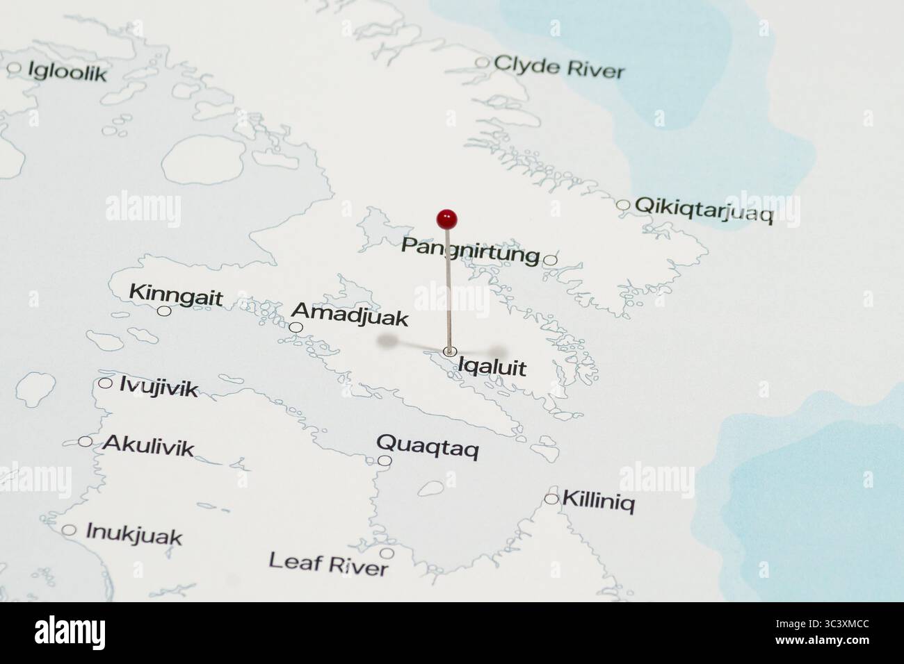 macro photo of a red pin needle into Iqaluit city of Canada political ...