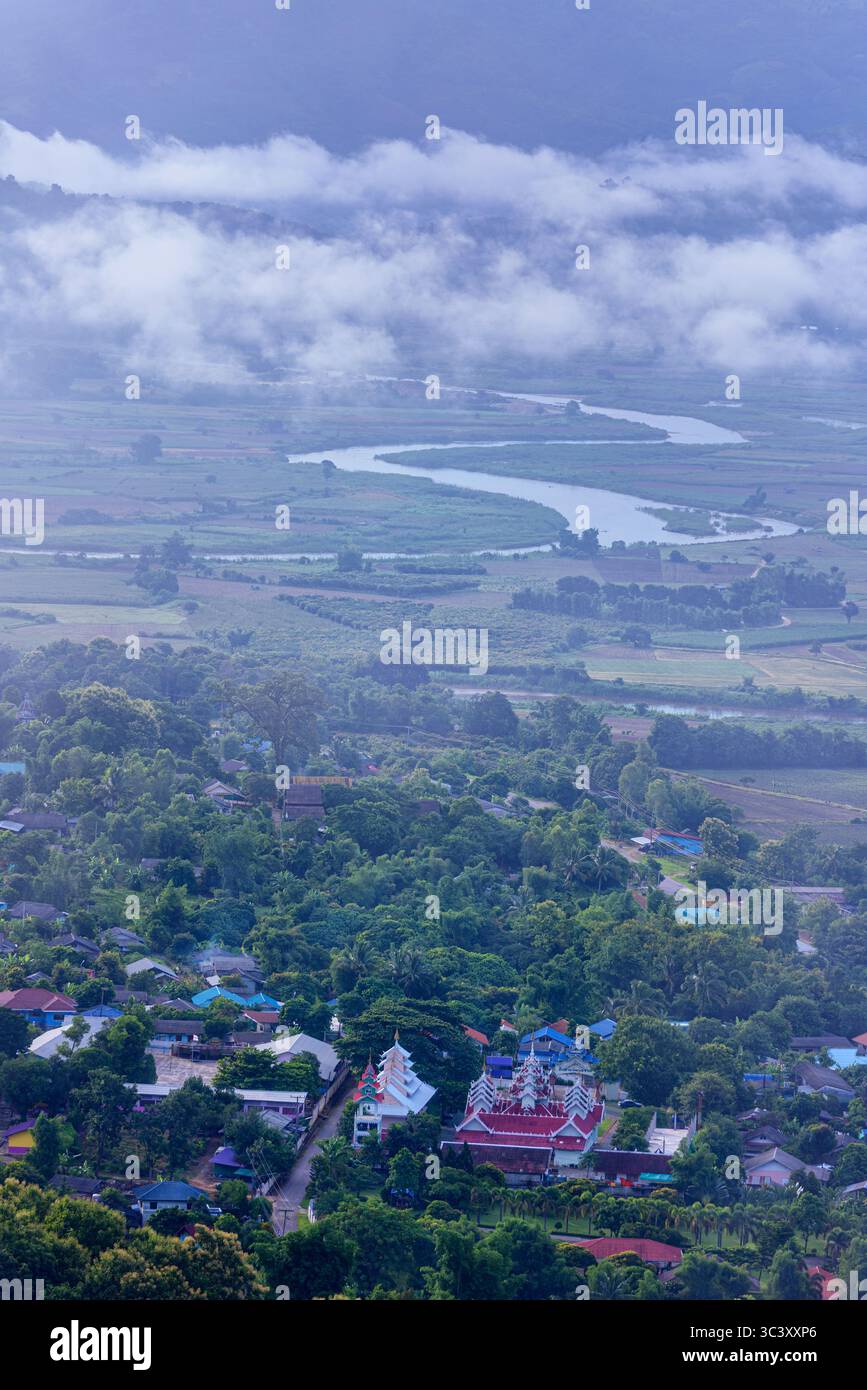 Aerial View of Tha Ton city in the valley with kok rivers, people ...