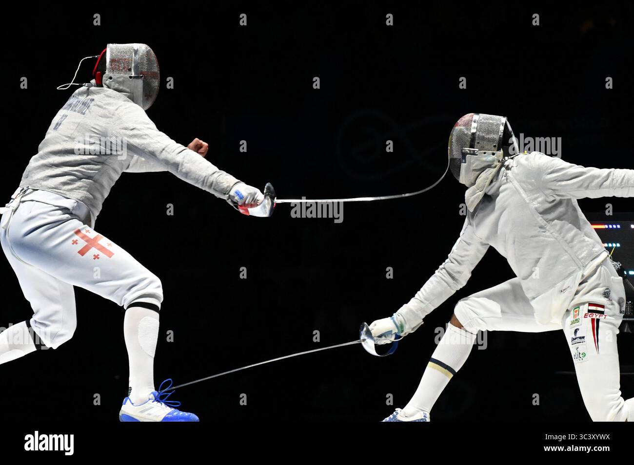 Georgia's Sandro Bazadze (L) fights against Egypt's Ziad El-Sissy ...