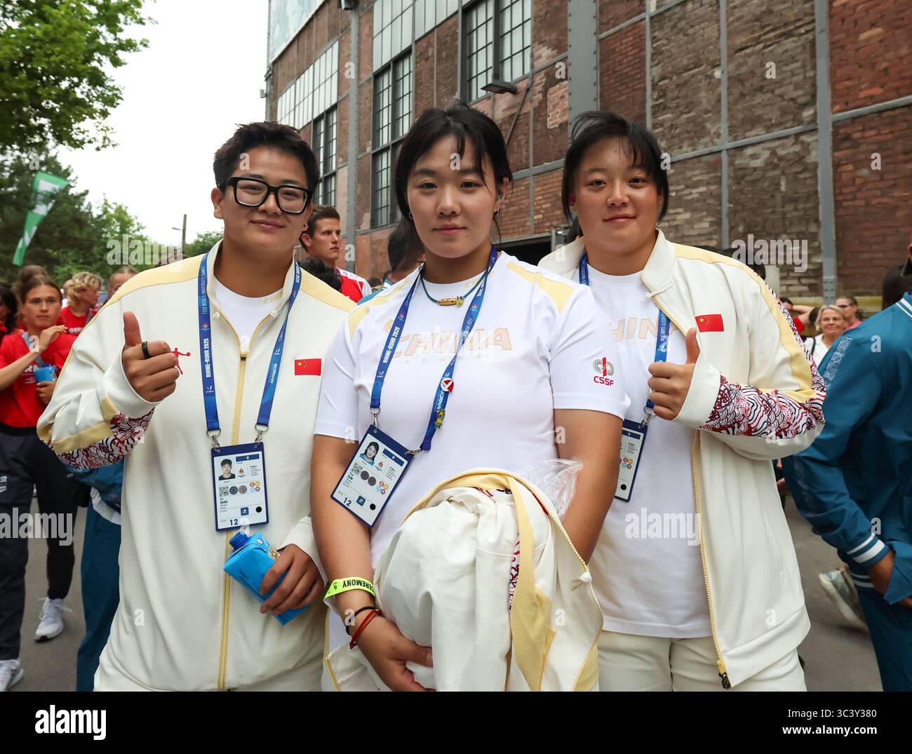Duisburg, Germany. 27th July, 2025. Zhao Jie, Sun Yue and Jiang Zhichao (from L to R) of China ...