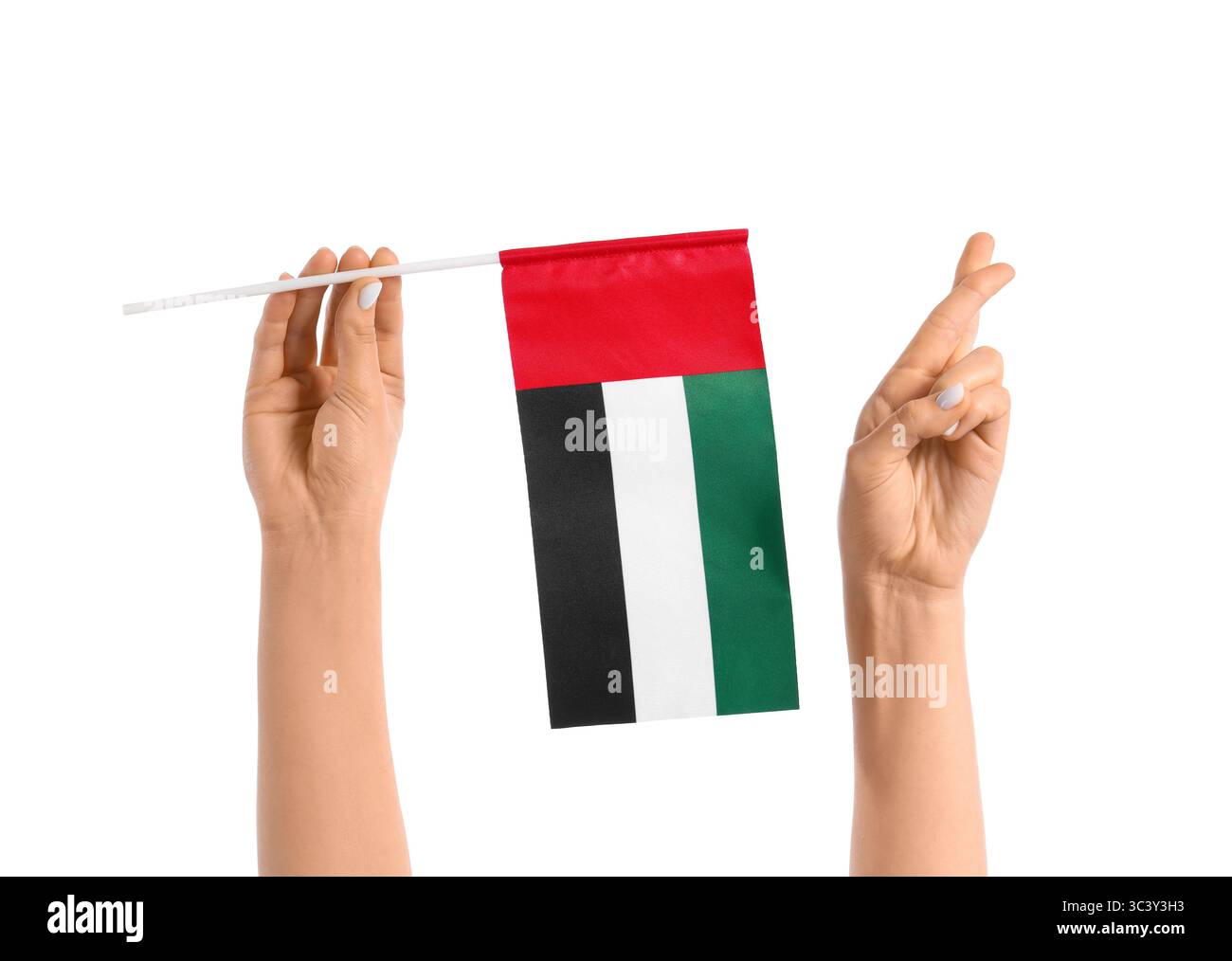 Female hands with UAE flag crossing fingers on white background Stock ...