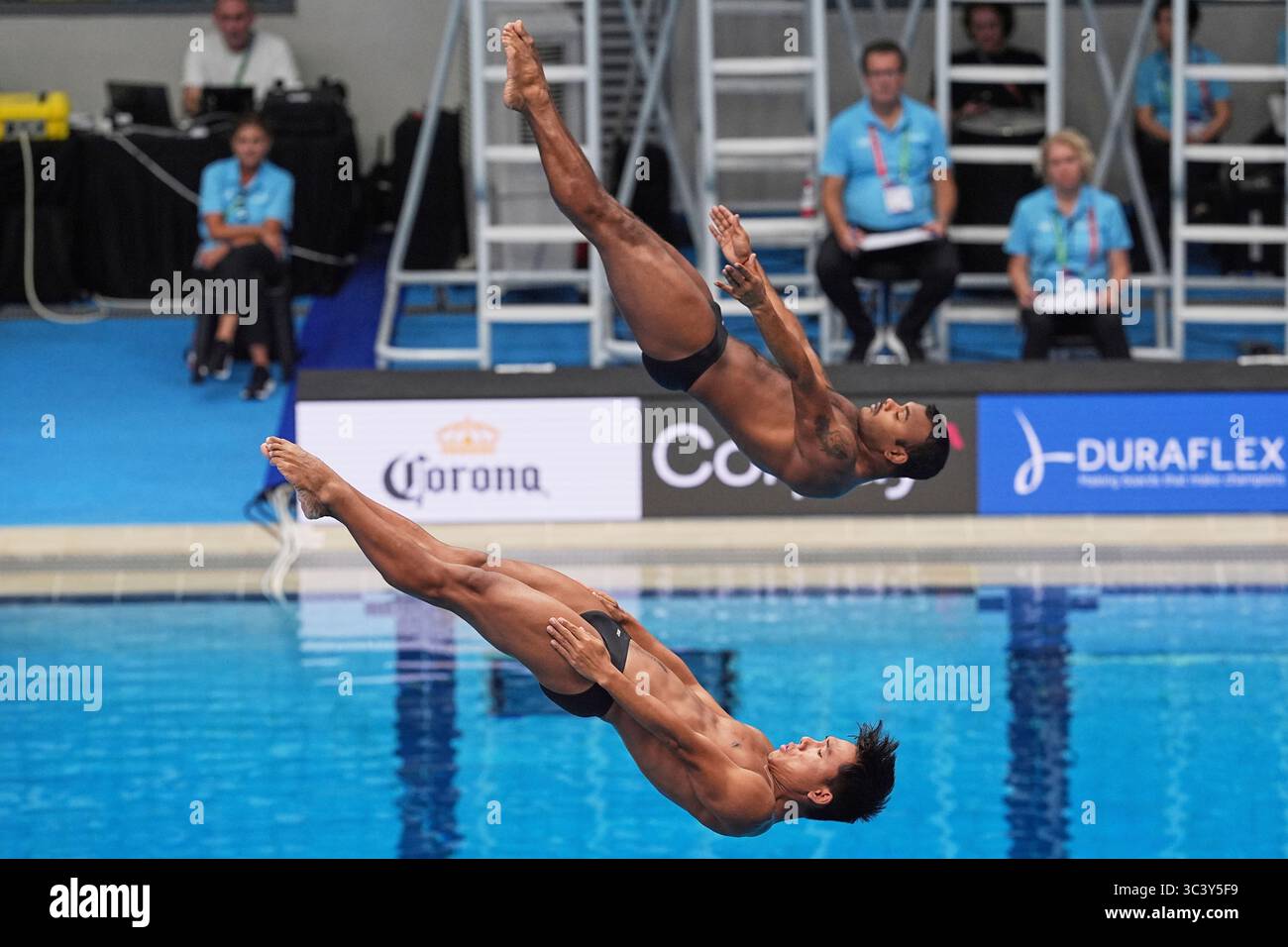 Surajit Rajbanshi and Premson Meitei Yumnam of India compete in the men ...