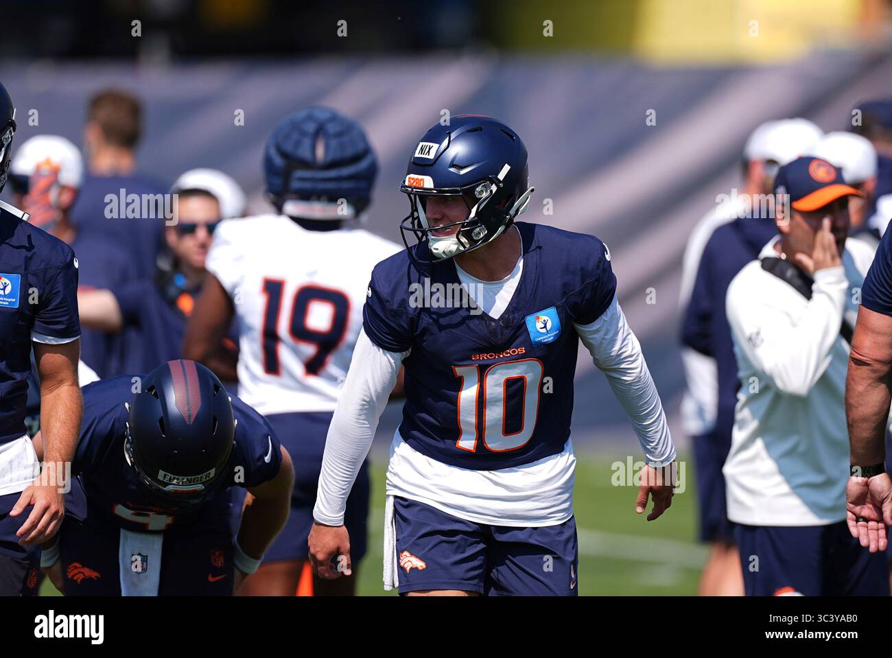 Denver Broncos quarterback Bo Nix (10) takes part in drills during an NFL football practice ...
