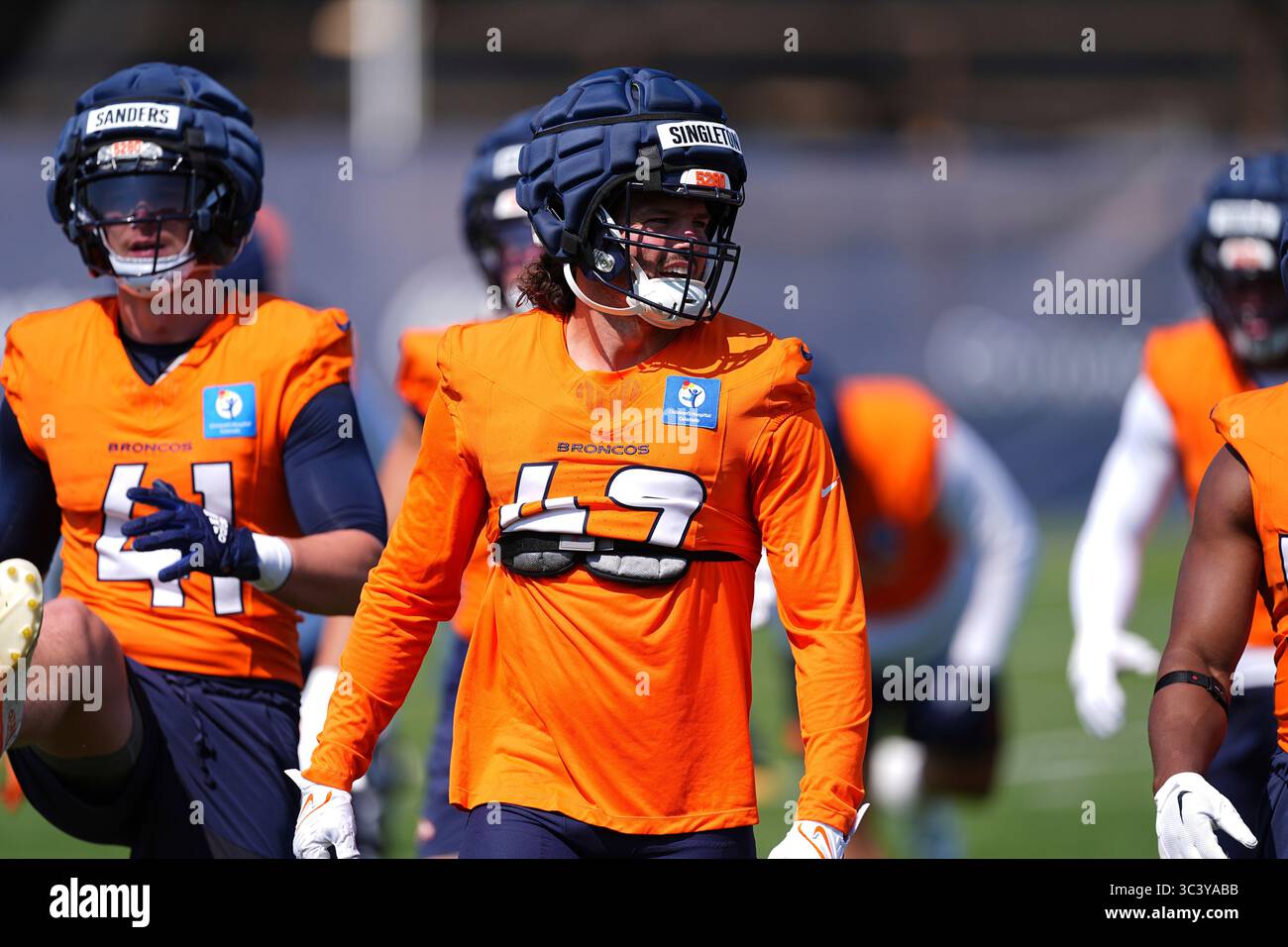 Denver Broncos linebacker Alex Singleton (49) takes part in drills during an NFL football ...