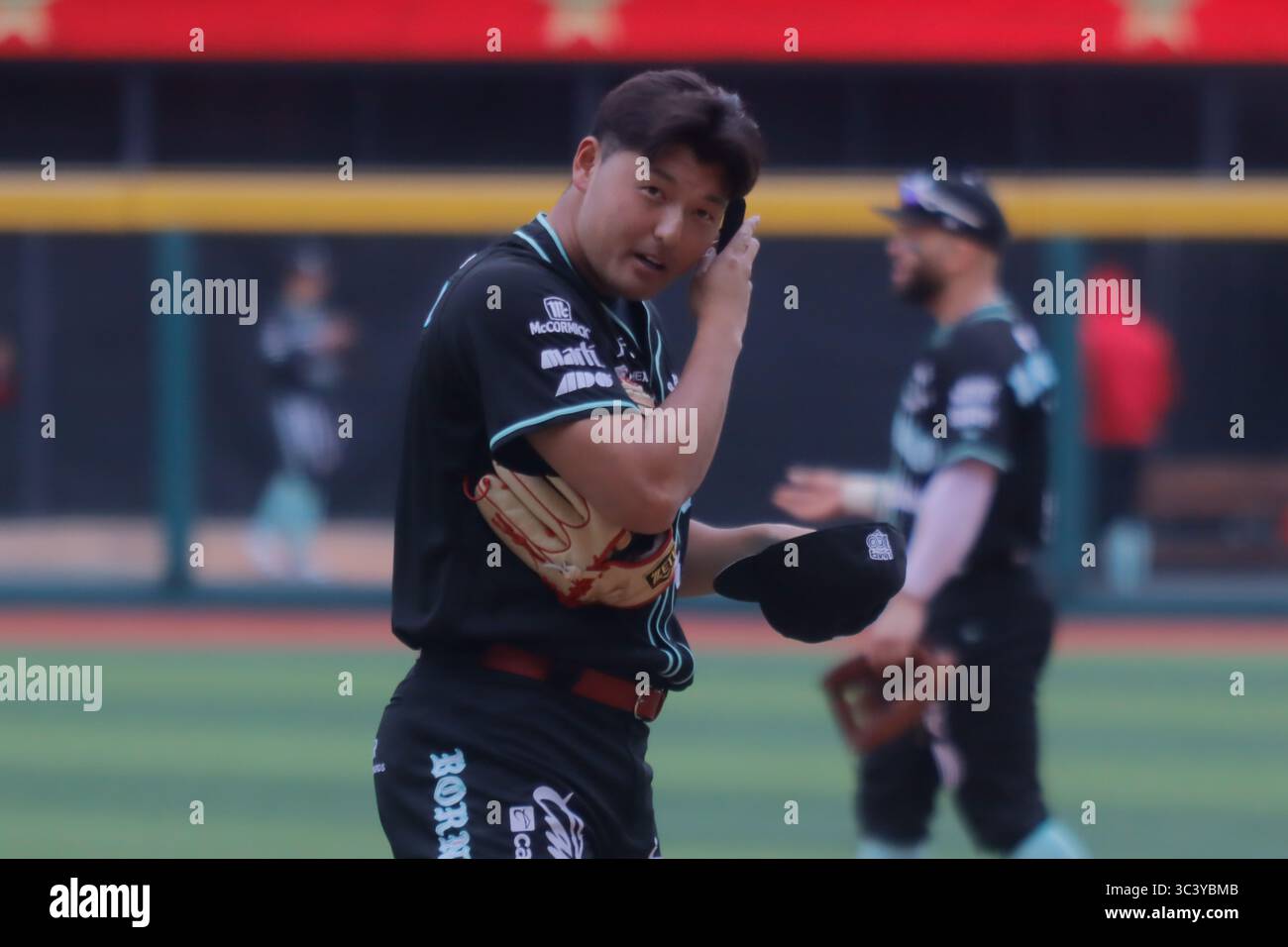 Mexico City, Mexico. 27th July, 2025. Tomohiro Anraku #20 of Diablos Rojos looks on during the ...