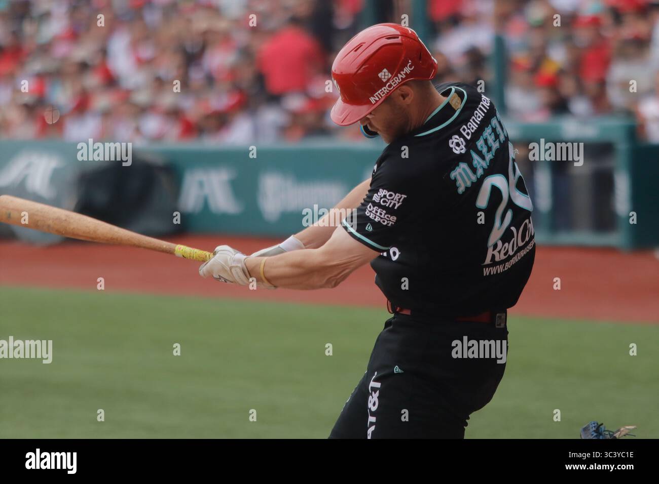 Patrick Mazeika #2 of Diablos Rojos bats during the game against Tigres ...