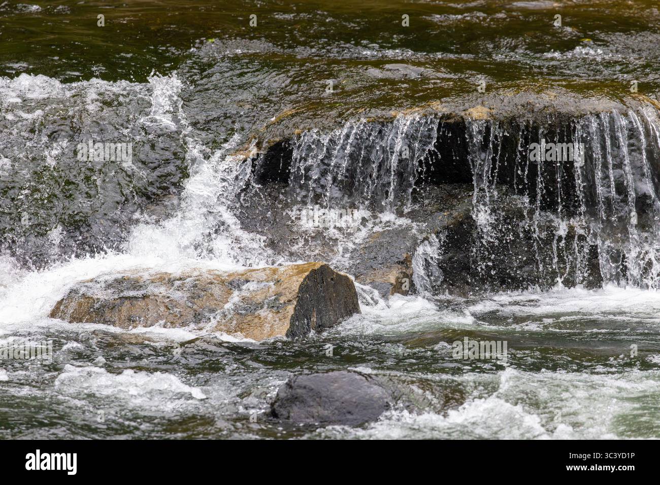 Waterfall over boulders hi-res stock photography and images - Alamy