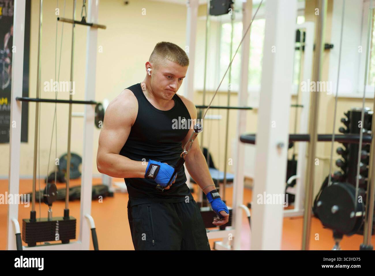 Ukrainian soldier Denys Zalizko, 21, works out in a gym at a ...