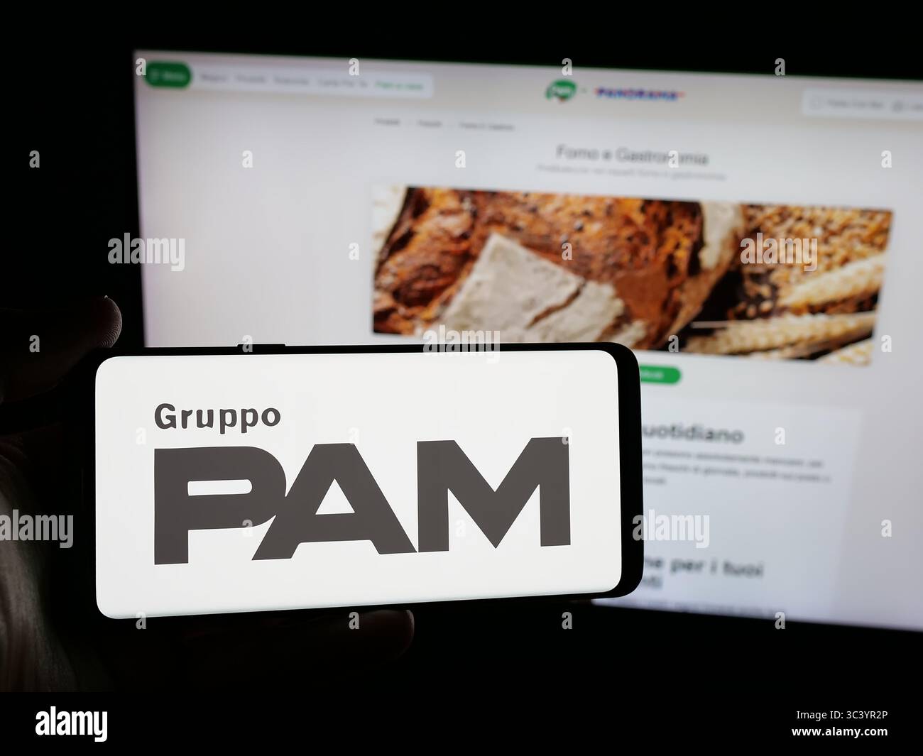 Stuttgart, Germany - 06-05-2025: Person holding smartphone with logo of ...