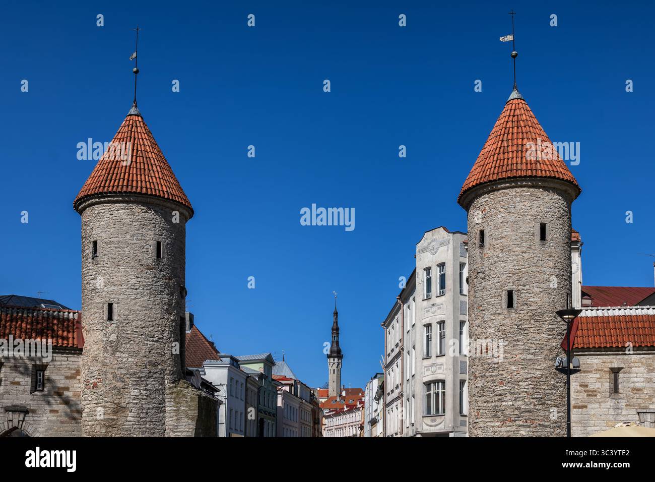 The Viru Gate medieval towers at the entrance to Old Town of Tallinn in ...