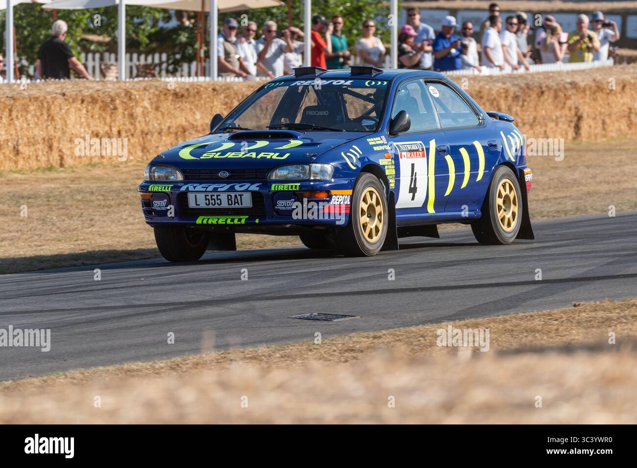 1995 Subaru Impreza 555 rally car of Colin McRae driving up the ...