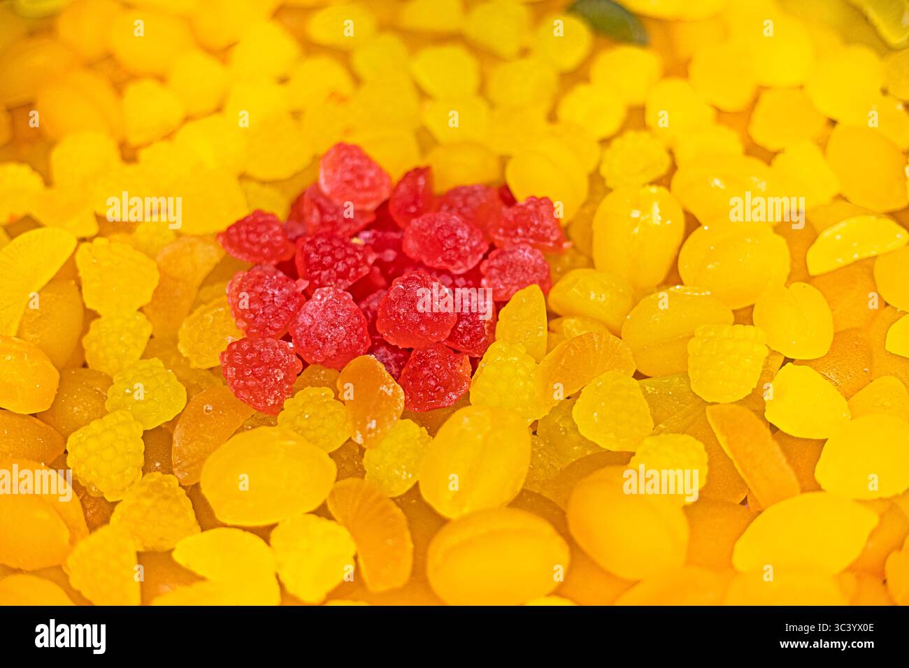 jelly candies in raspberry and lemon shapes in a confectionery Stock ...
