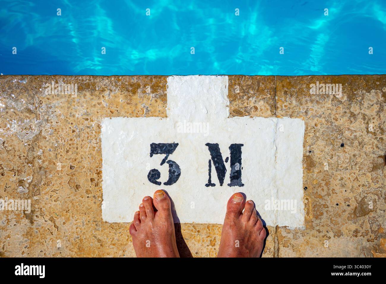 Feet of Caucasian man near edge of 3 meter deep swimming pool Stock ...