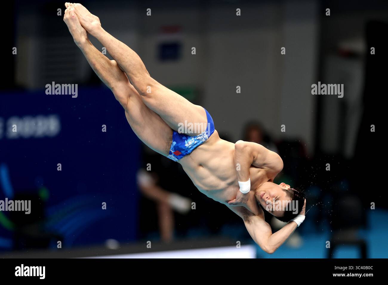 Cao Yuan competes in the 3m springboard event. Singapore City ...