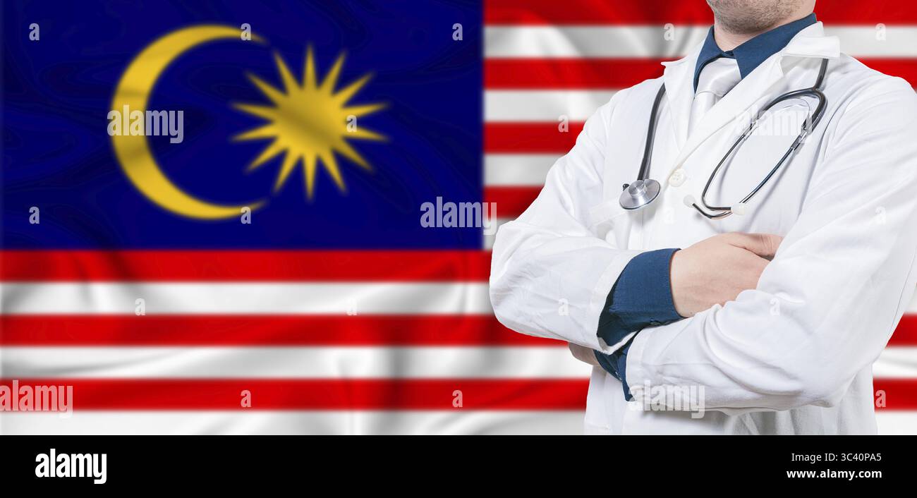 Malaysia healthcare concept. Male doctor on Malaysia flag. Doctor with ...