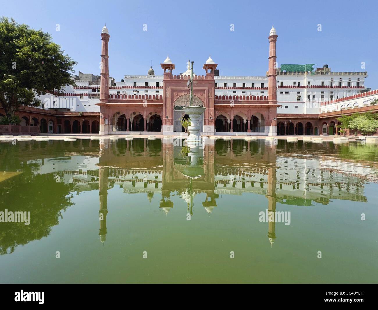 Historic architecture with symmetrical columns and reflection in a ...